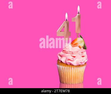 Birthday cake with candle number 41 - Rhodamine Red foamy background ...