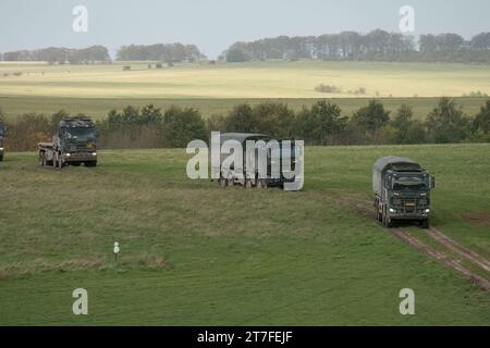 a convoy of Dutch (Netherlands) army Scania utility trucks in action on ...