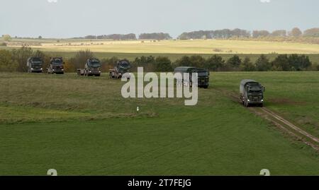 a convoy of Dutch (Netherlands) army Scania utility trucks in action on ...