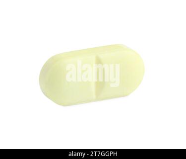 One yellow pill isolated on white. Medicinal treatment Stock Photo - Alamy