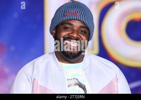 Ron Funches arrives at the premiere of "Trolls Band Together" on ...