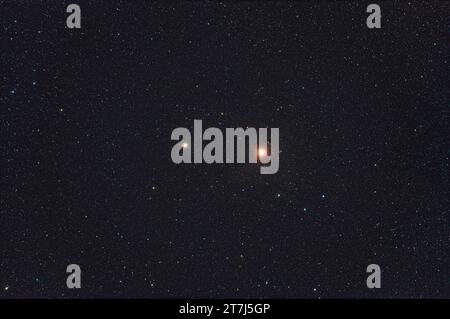 Mars (at right) near the orange giant star Mebsuta, aka Epsilon ...