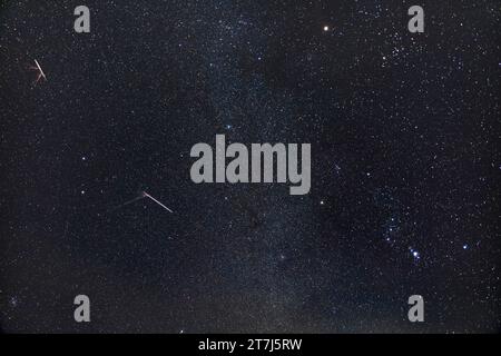 The Geminid meteor shower of 2022, showing two bright Geminids Stock ...