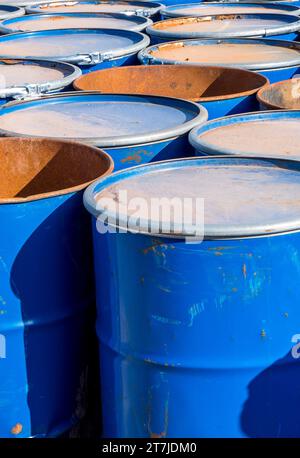 Old chemical barrels. Stack of blue methanol or methyl alcohol drum ...