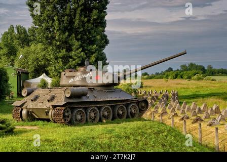 Soviet T-34 tank, dragons teeth anti-tank obstacles at World War Two ...
