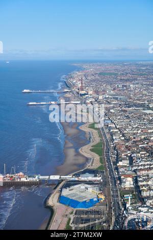 An aerial photograph of the sea side front and beach at the resort town ...