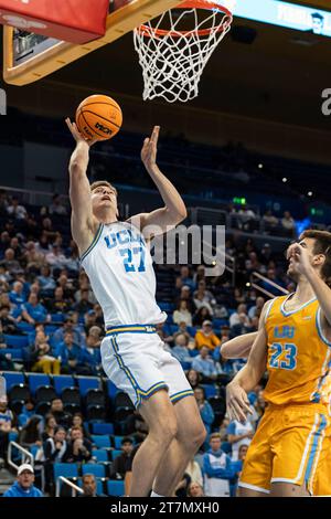 UCLA Bruins guard Jan Vide (27) scores during a NCAA men’s basketball ...