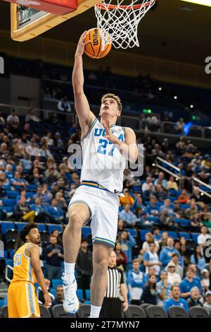 UCLA Bruins guard Jan Vide (27) scores against LIU Sharks forward ...