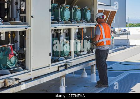 Open door in compressor panel for a cold-storage (industrial ...