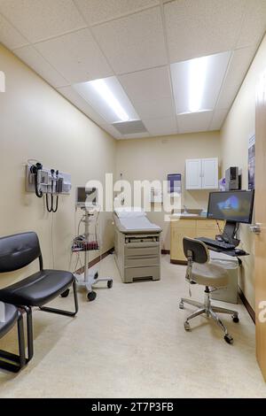 Medical Examination and Treatment Table Chair in the corner of a ...