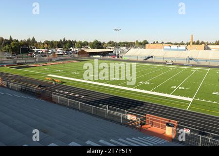 A newly renovated high school football field, with new artificial turf ...