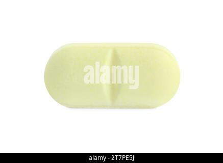 One yellow pill isolated on white. Medicinal treatment Stock Photo - Alamy