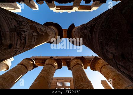 Giant stone columns engraved with hieroglyphics inside the ancient ...