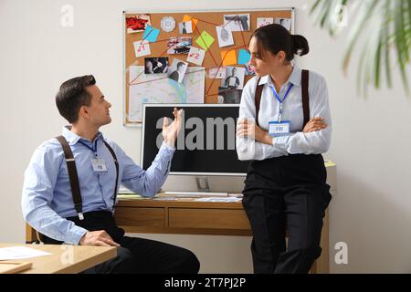 FBI agents investigating case in stairway Stock Photo - Alamy