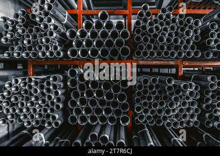 Stacked in the steel tube Stock Photo - Alamy
