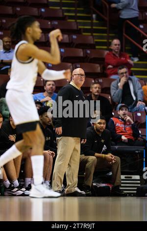 Wake Forest head coach Steve Forbes, front lrft, looks toward the court ...
