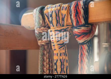 Many colorful belts with patterns. Folk art, handmade, Knitting of a ...