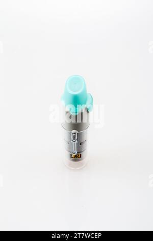 Asthma inhaler with cartridge for breathing disease treatment on light ...