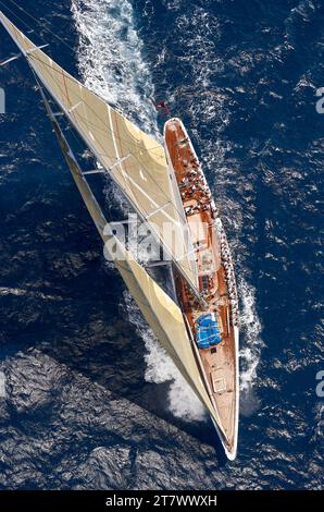 Aerial photo of J class RANGER under full sail racing in a choppy sea ...