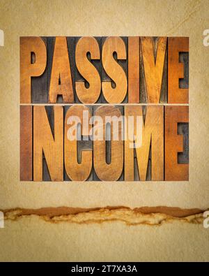 passive income - word abstract in letterpress wood type, business and ...