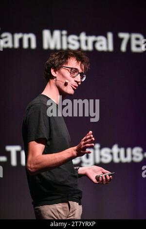 Arthur Mensch, CEO of Mistral AI, carries a cup at Station F, during an ...