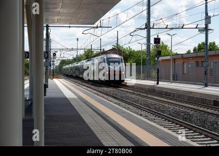 Italian electric high speed train passes through the station Stock ...