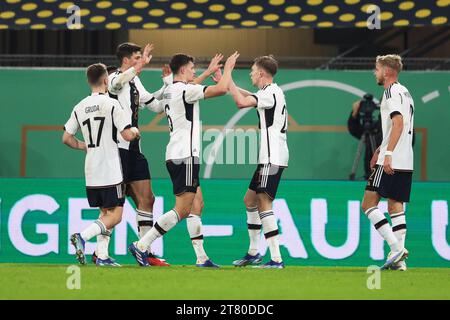 Germany's Merlin Rohl, right, celebrates with teammates after scoring ...
