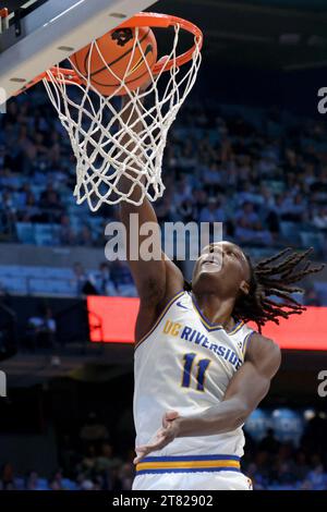 UC Riverside guard Nate Pickens, left, tries to drive around North ...