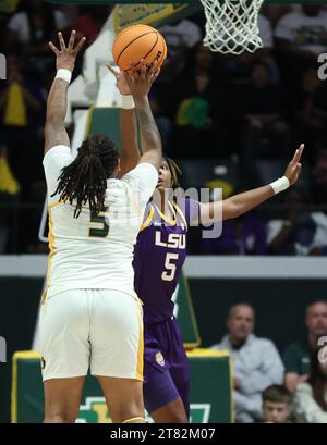 LSU forward Sa'Myah Smith (5) shoots under pressure from Florida guard ...