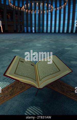 Islamic vertical background photo. Holy Quran in the mosque at sunset ...