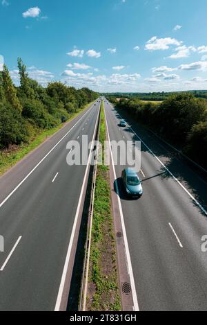 Cars travel along the A1 M motorway in Hertfordshire. England in the UK ...