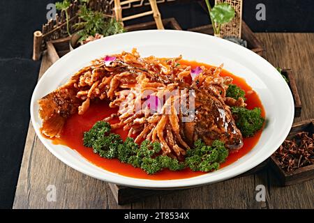 Squirrel shaped Song Shu deep fried cooked whole Mandarin fish with ...