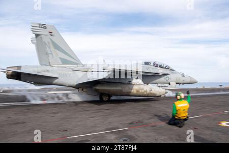 PACIFIC OCEAN (Nov. 13, 2023) Rear Adm. Christopher Alexander, left ...