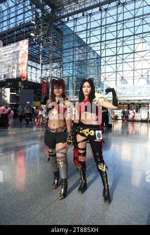 Cosplayer Joanna from New York and Green from Philadelphia are dressed as Dehya and Dio from ...