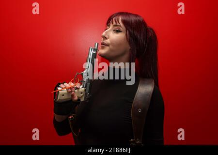 Cosplayer Toby Lee from Pittsburgh comes dressed as the character Revy ...