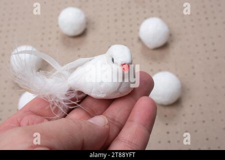 Fake feather bird for decoration on paper Stock Photo - Alamy