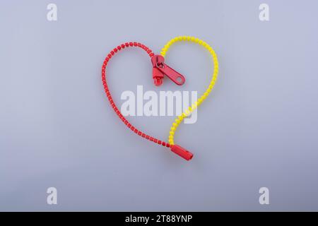 Heart shaped made by the help of a zipper on white background Stock ...