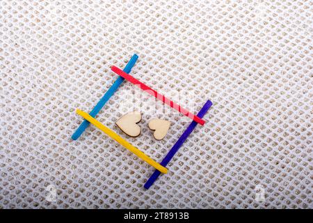 Heart shapes framed by sticks as love concept Stock Photo - Alamy