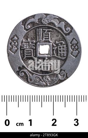 Ancient Chinese silver coin with a square hole 1. Reverse. Isolated on ...