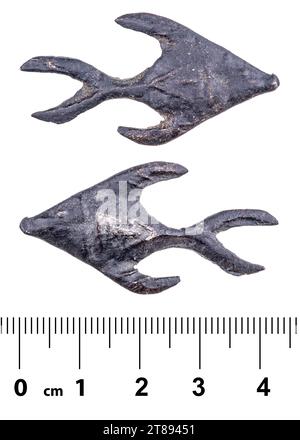 Ancient malaysian fish tin coin. Isolated on white Stock Photo - Alamy