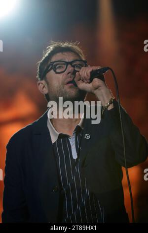 Lead singer of the band Blur Damon Albarn accompanied by his girlfriend ...
