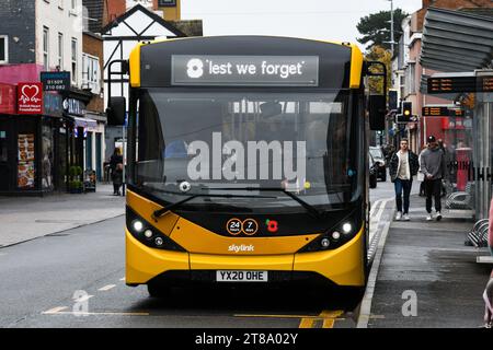 skylink bus with lest we forget displayed Stock Photo - Alamy
