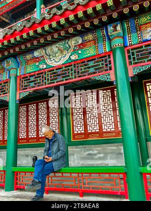 Man sitting in a buddhist center in western France Stock Photo - Alamy