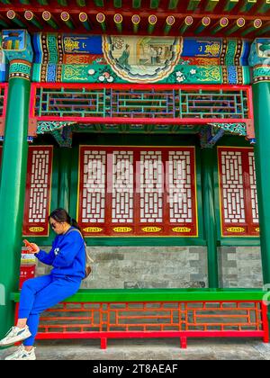 China, Beijing. Old Woman visiting the Summer Palace in Beijing with ...