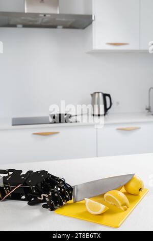 Real robot's hand with sharp knife. Concepts of Technological ...