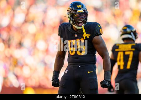 Washington Commanders defensive end KJ Henry (55) celebrates after a ...