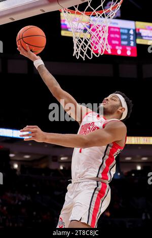 Michigan guard Roddy Gayle Jr. (11) takes a shot against Washington ...