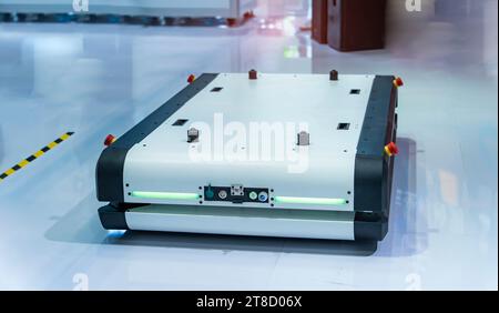 warehouse robot car carries cardboard box assembly in factory Stock Photo - Alamy