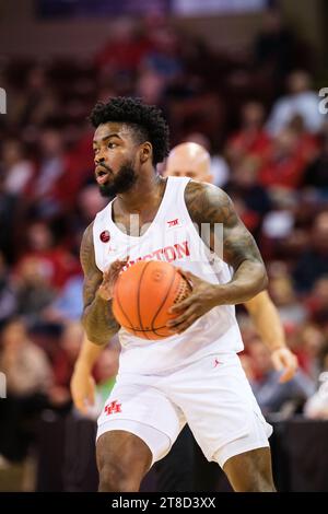 Houston guard Jamal Shead (1) dribbles during the first half of an NCAA ...