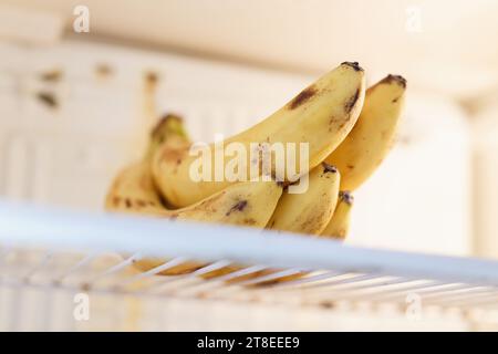 ripe tasty bananas on shelf in fridge Stock Photo - Alamy